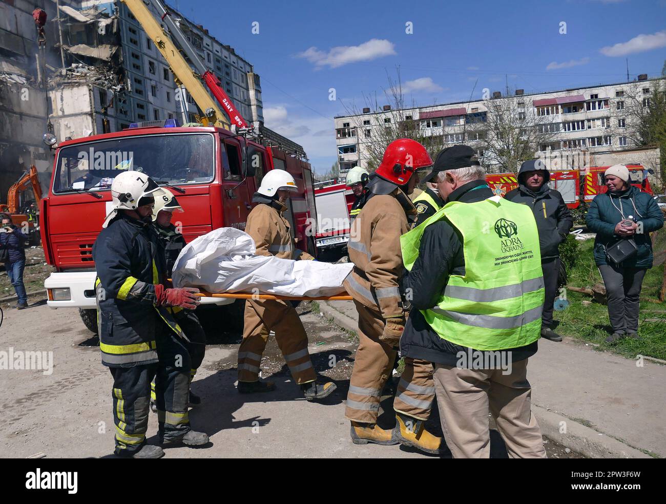 UMAN, UKRAINE - APRIL 28, 2023 - Rescuers carry the stretcher with the ...