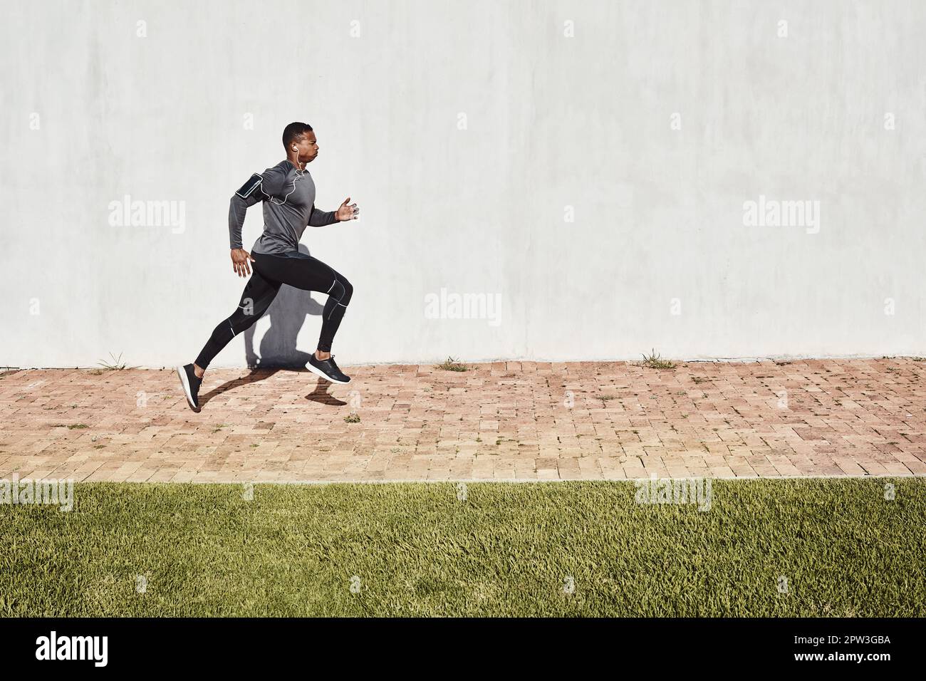 Building his fitness. Full length shot of a handsome and athletic young ...