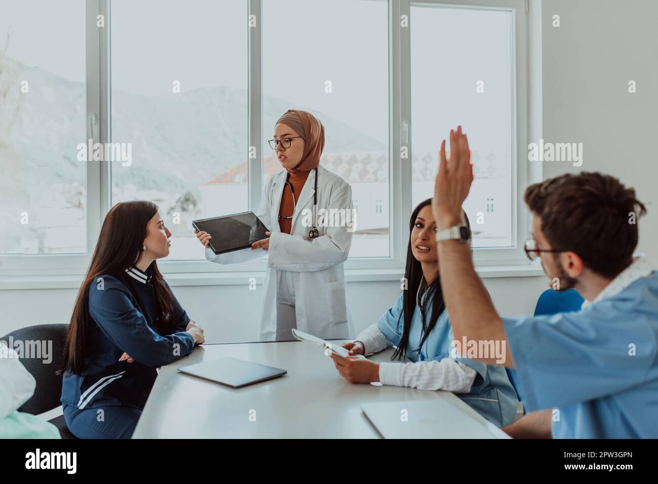 A group of multiethnic medical professionals including doctors ...