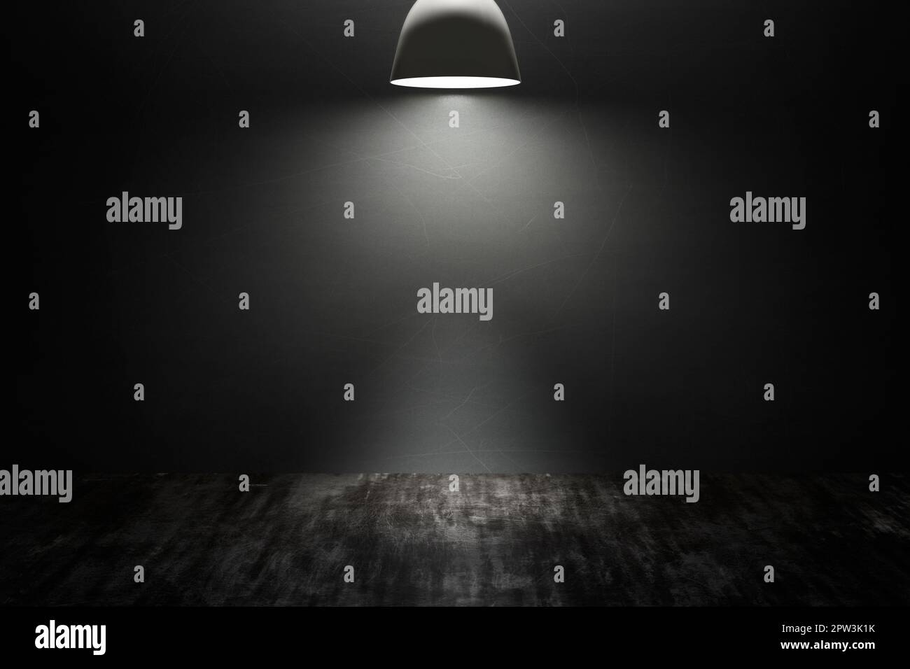 Empty space of dark studio room with concrete wall and pendant lamp ...