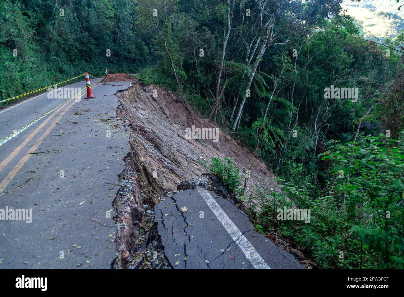 asphalt road damaged by a landslide in a mountain area Stock Photo - Alamy