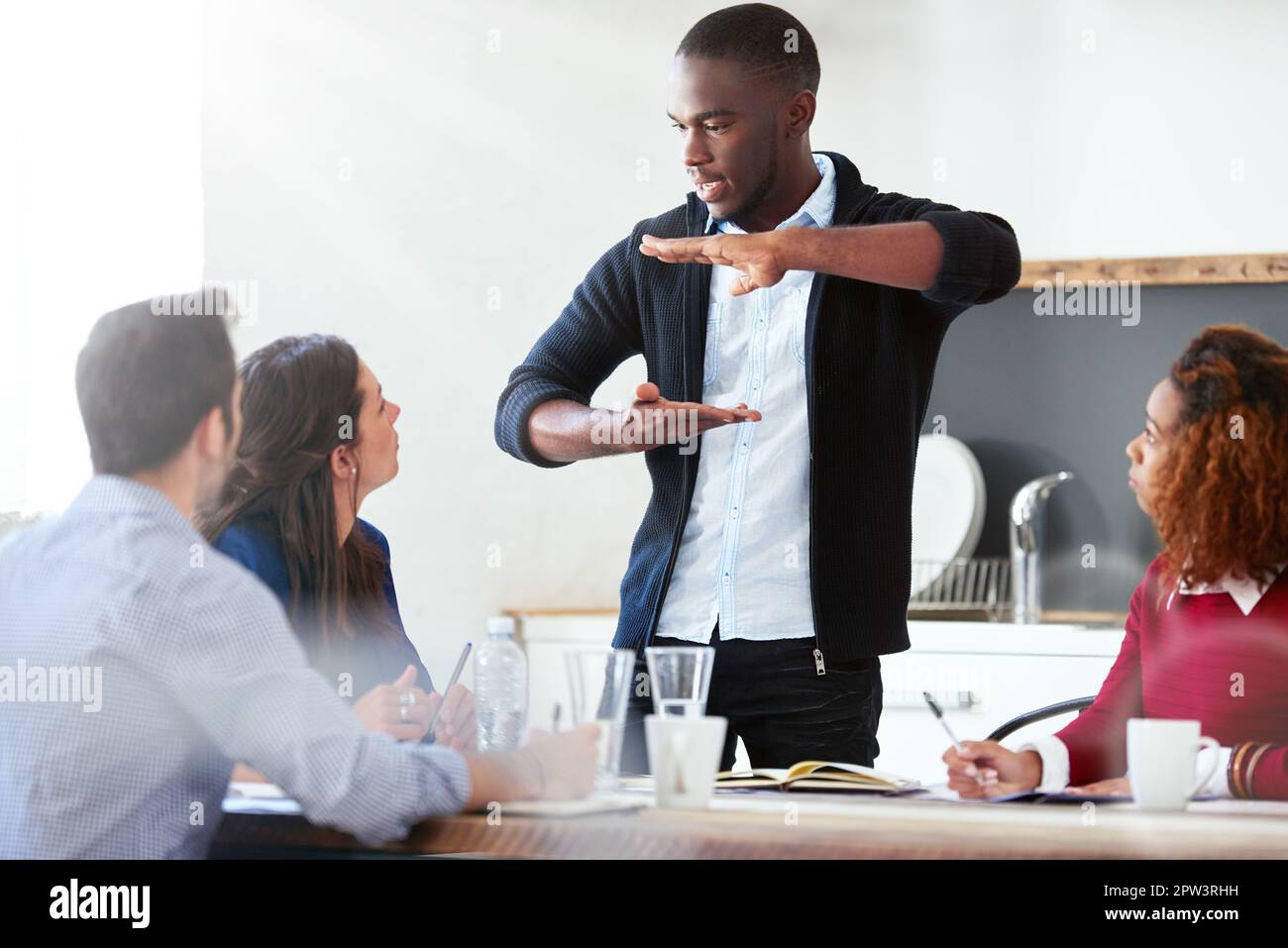 African man addressing people hi-res stock photography and images - Alamy