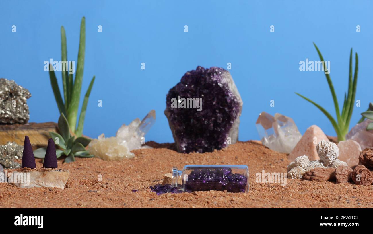 Chakra Stones and Flowers on Australian Red Sand Meditation Altar Stock ...