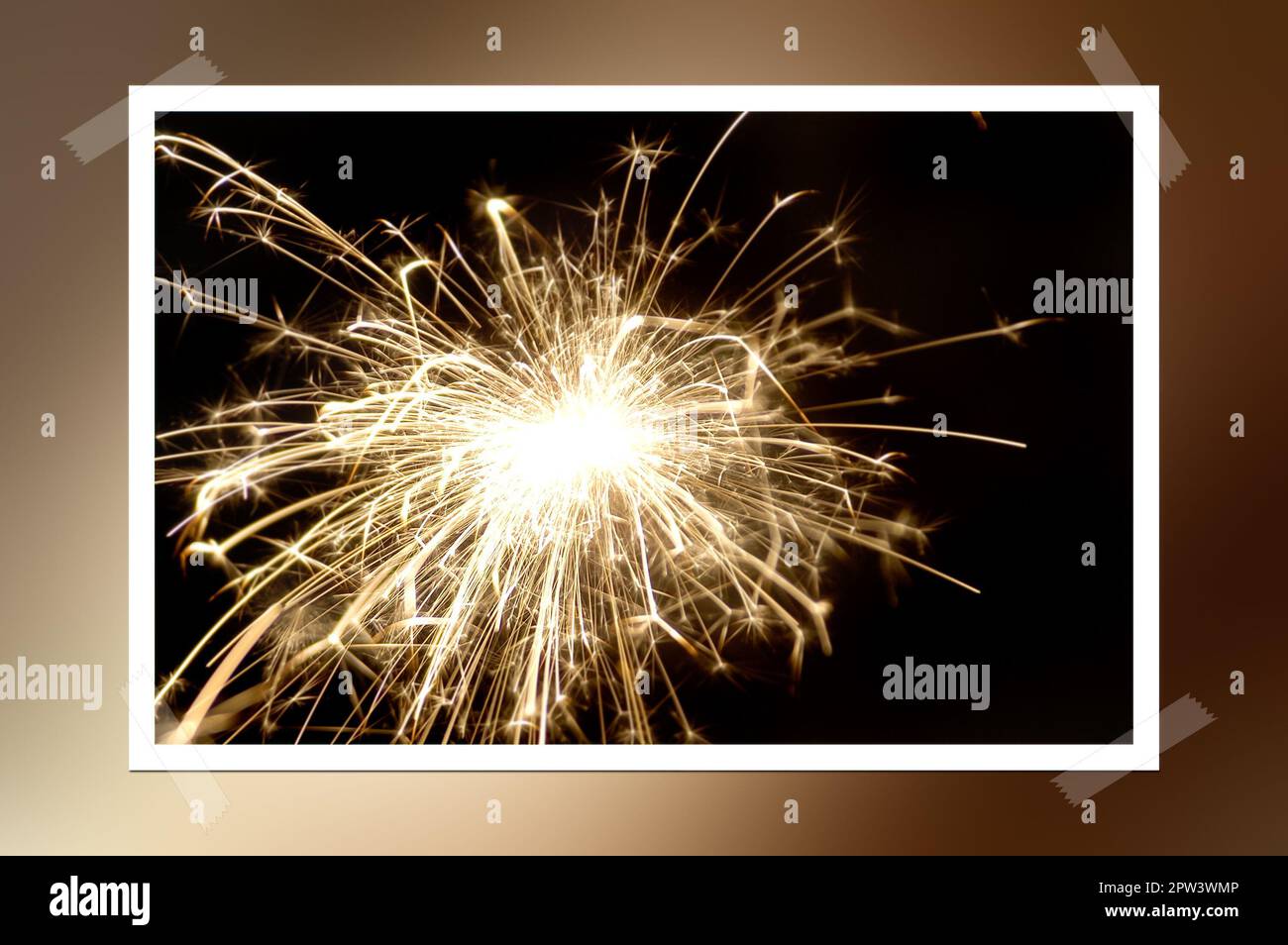 A sparkling sparkler at a party or New Year's Eve Stock Photo - Alamy