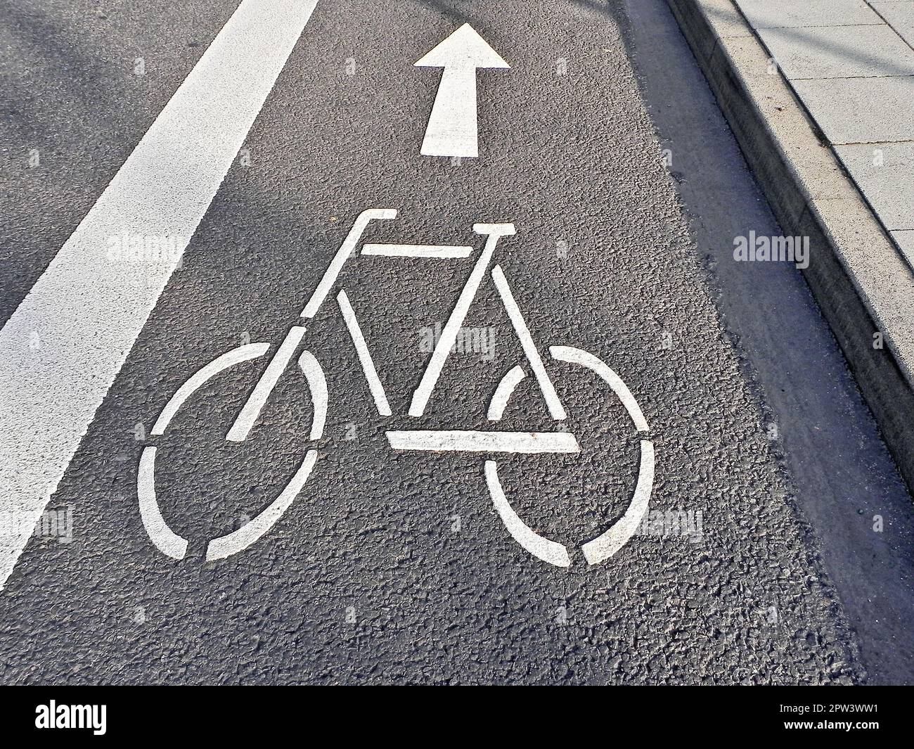 Cycle path, bicycle symbol as a lane marking or road marking on a road ...