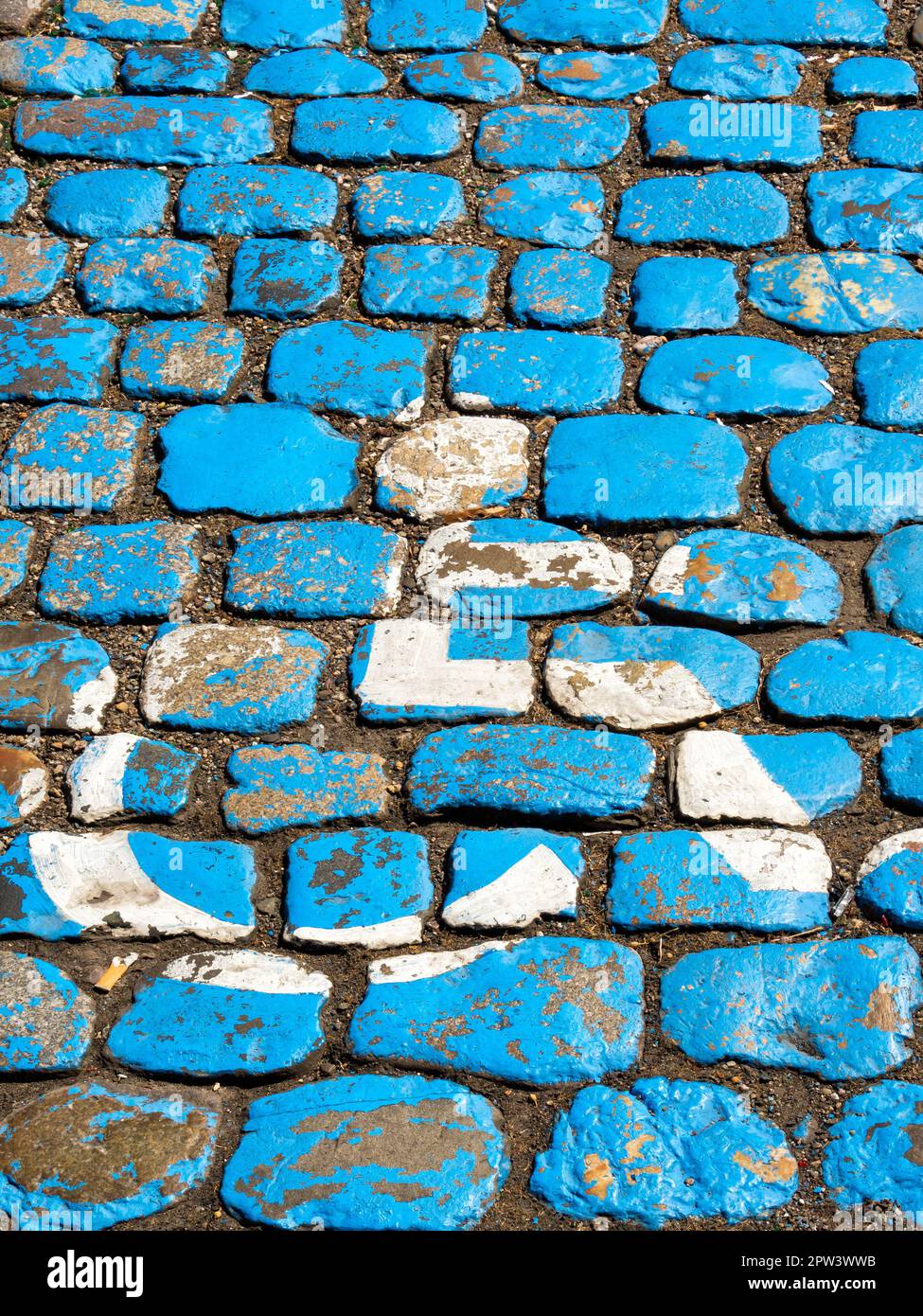 Disabled parking space, symbol of a wheelchair user as a lane marking ...