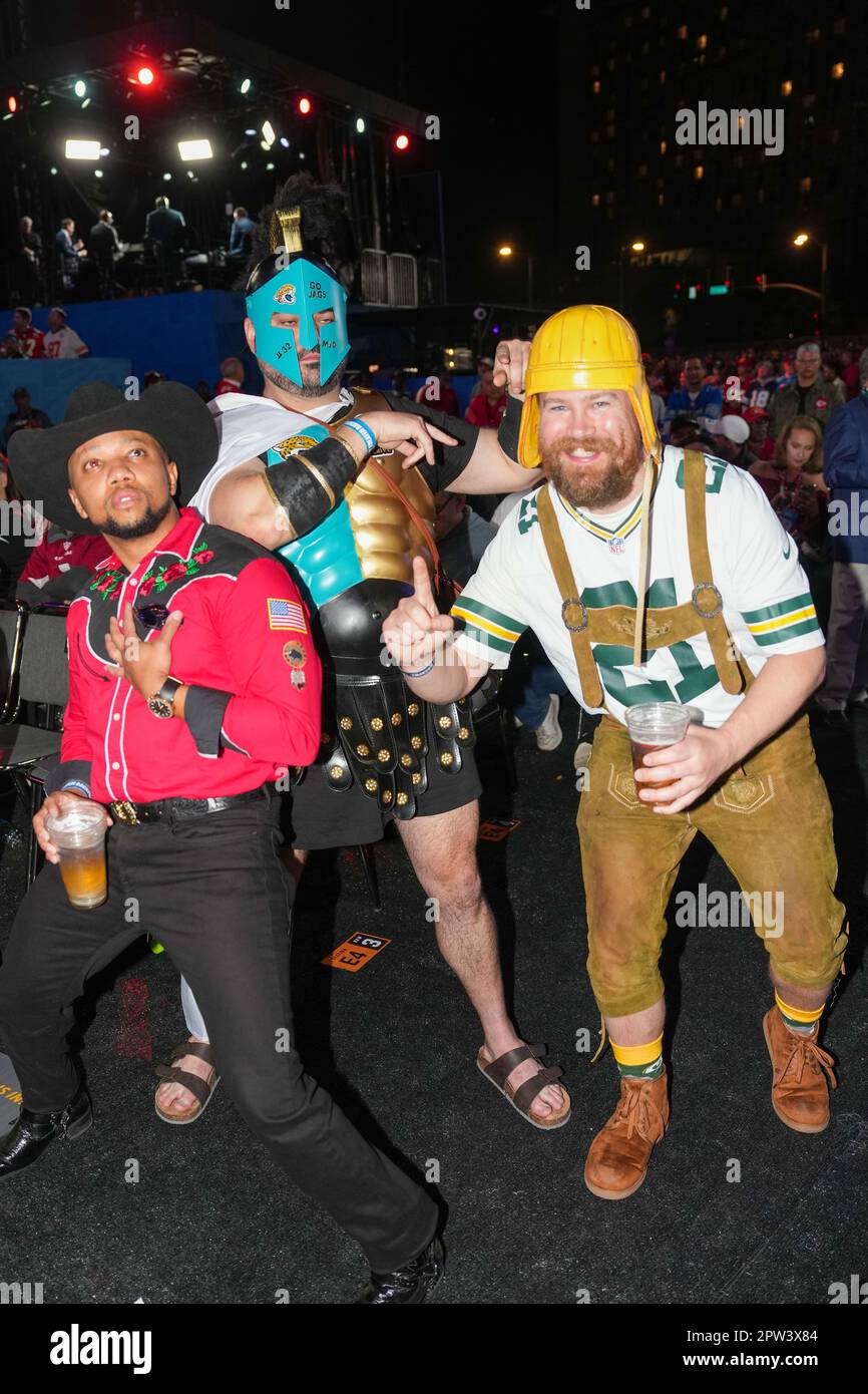 NFL fans pose for a picture during the NFL Draft 2023 Thursday Day 1 on ...