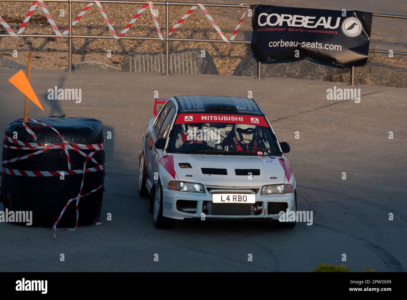 Wayne Larbalestier racing a Mitsubishi Evo 3 competing in the Corbeau ...
