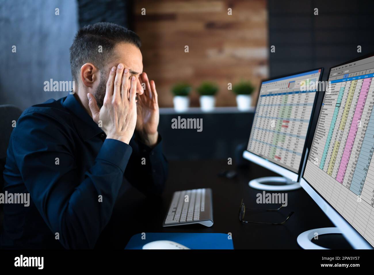 Stressed Depressed Man At Desk. Tired Bored Businessman Stock Photo - Alamy