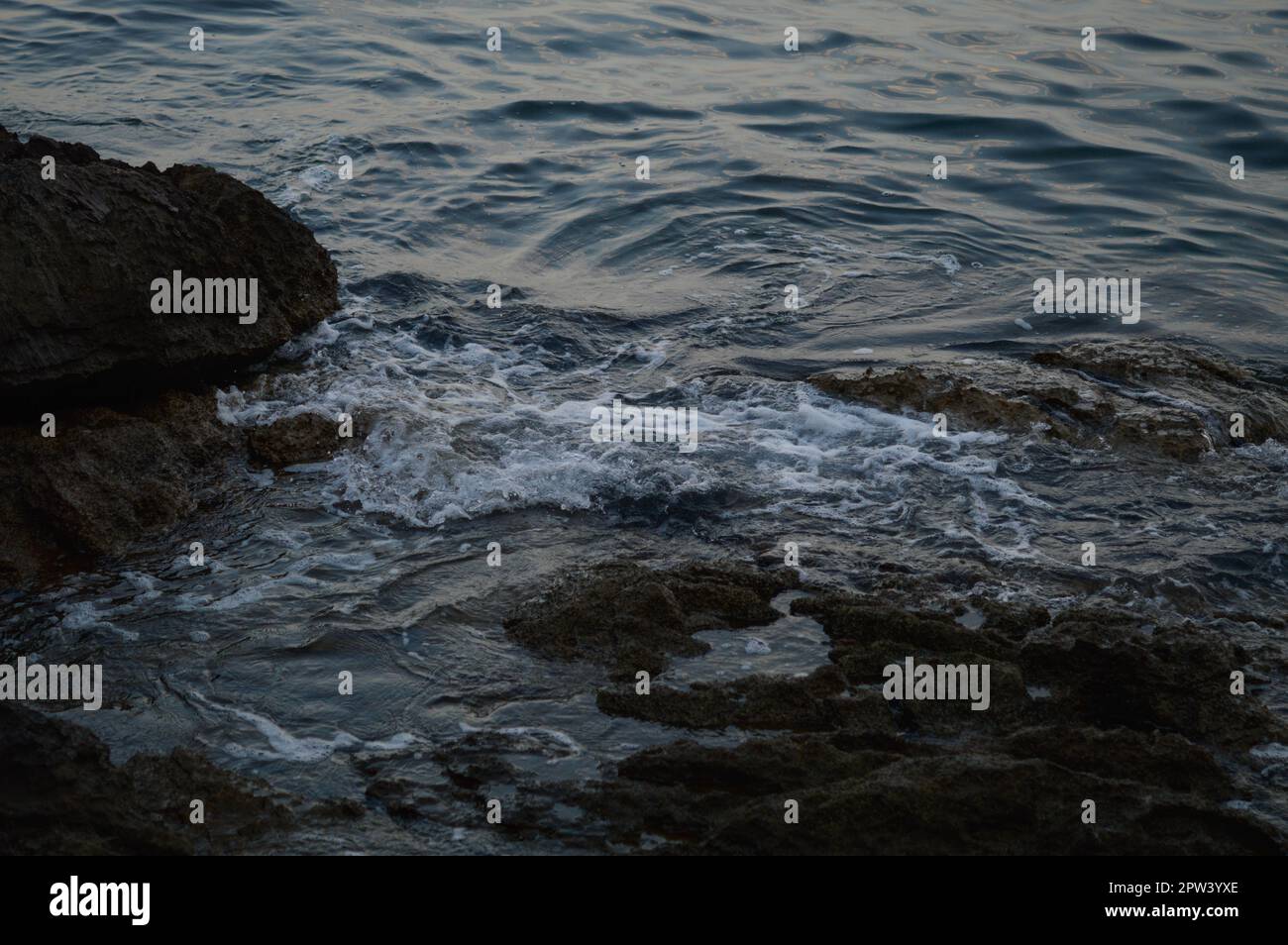 Sea waves crashing into rocks. Storm at the sea, dark, moody photo ...