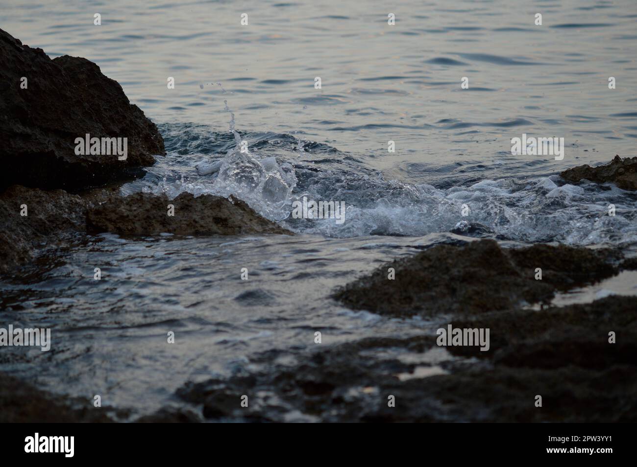 Sea waves crashing into rocks. Storm at the sea, dark, moody photo ...