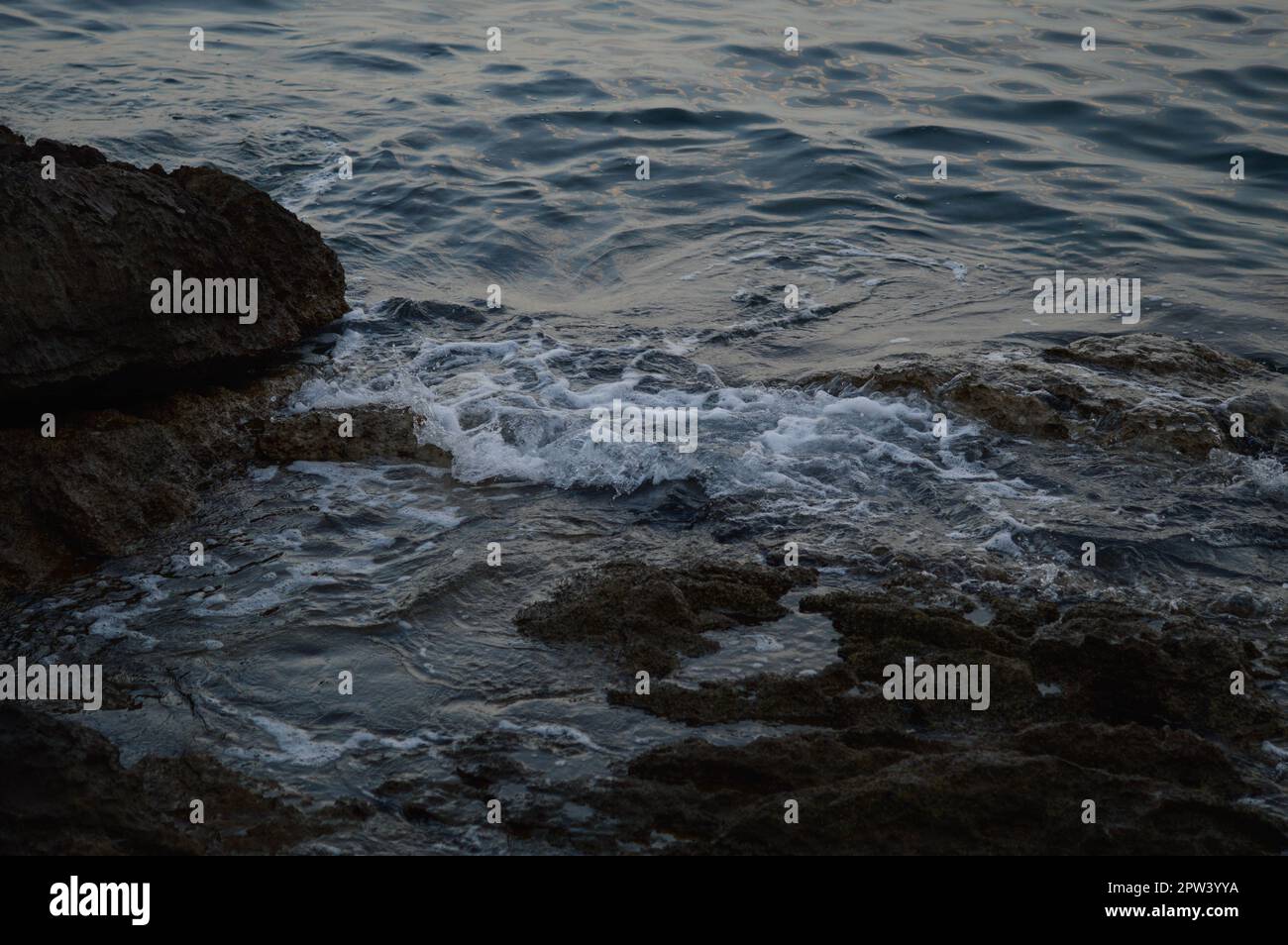 Sea waves crashing into rocks. Storm at the sea, dark, moody photo ...