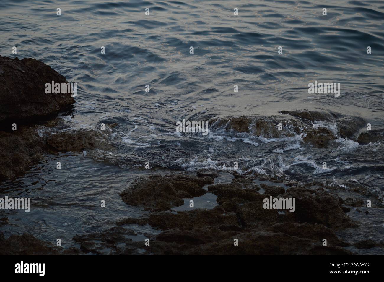 Sea waves crashing into rocks. Storm at the sea, dark, moody photo ...