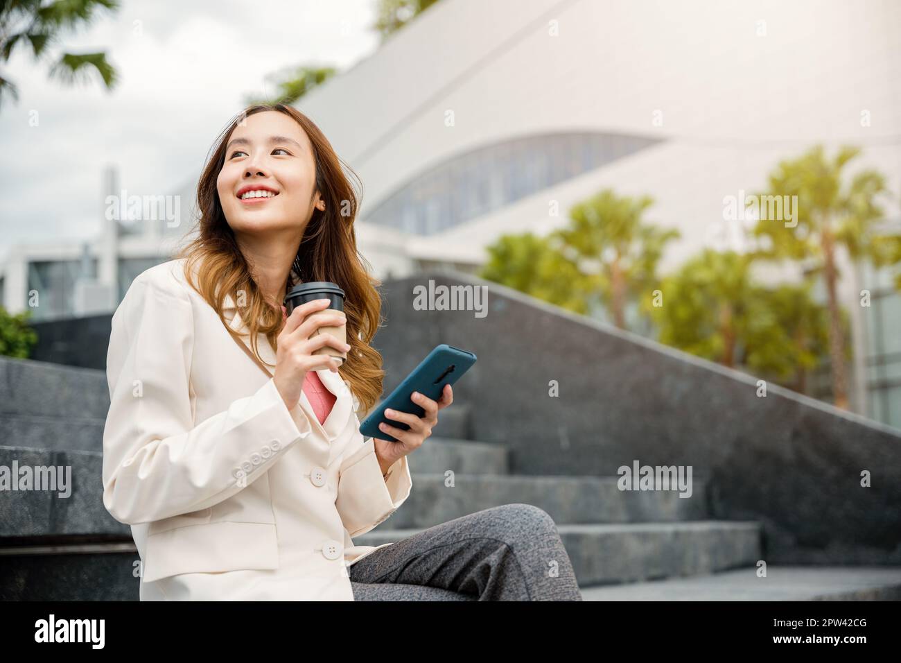 Lifestyle woman business people smiling using mobile smart phones in ...