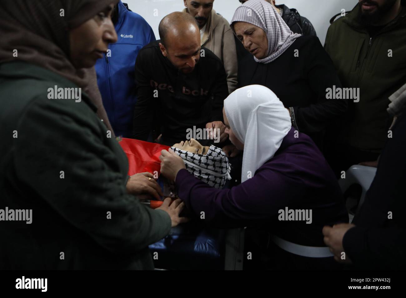 Bethlehem. 28th Apr, 2023. Palestinians mourn over the body of Omran Al ...