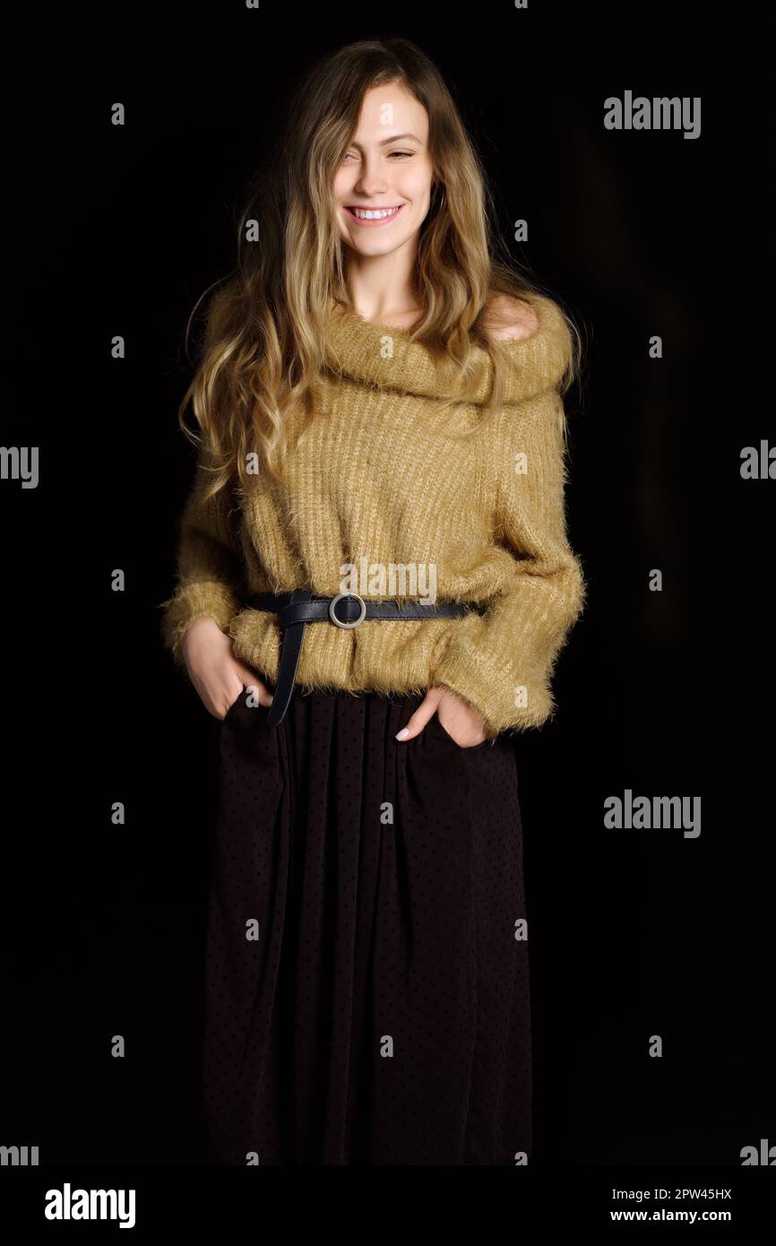 Funny girl giving a wink, grimace and laughing. Emotional happy girl ...