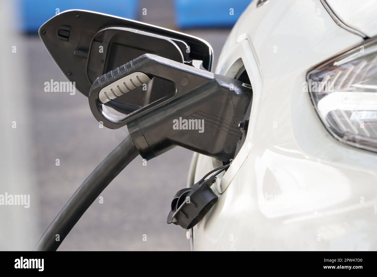 electric car loading battery on the city street Stock Photo - Alamy