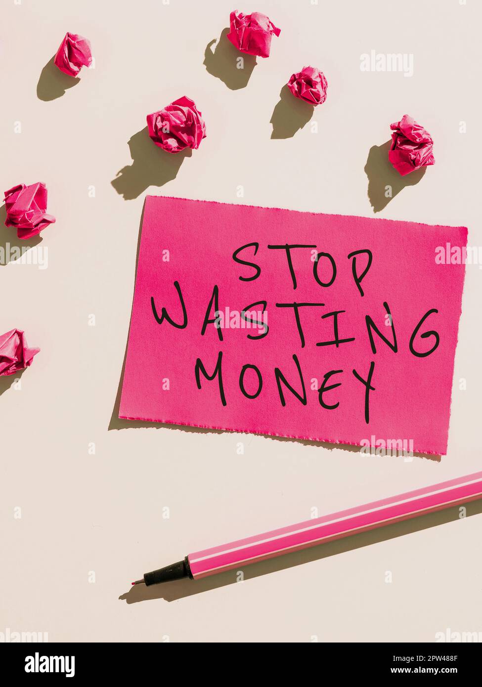 Sign displaying Stop Wasting Money, Word Written on advicing person or ...
