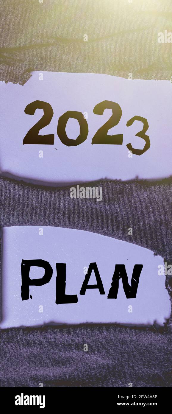 Hand writing sign 2023 Plan, Business showcase setting up your goals ...