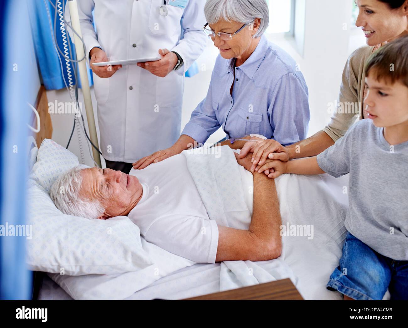 Sick Man In Hospital Bed