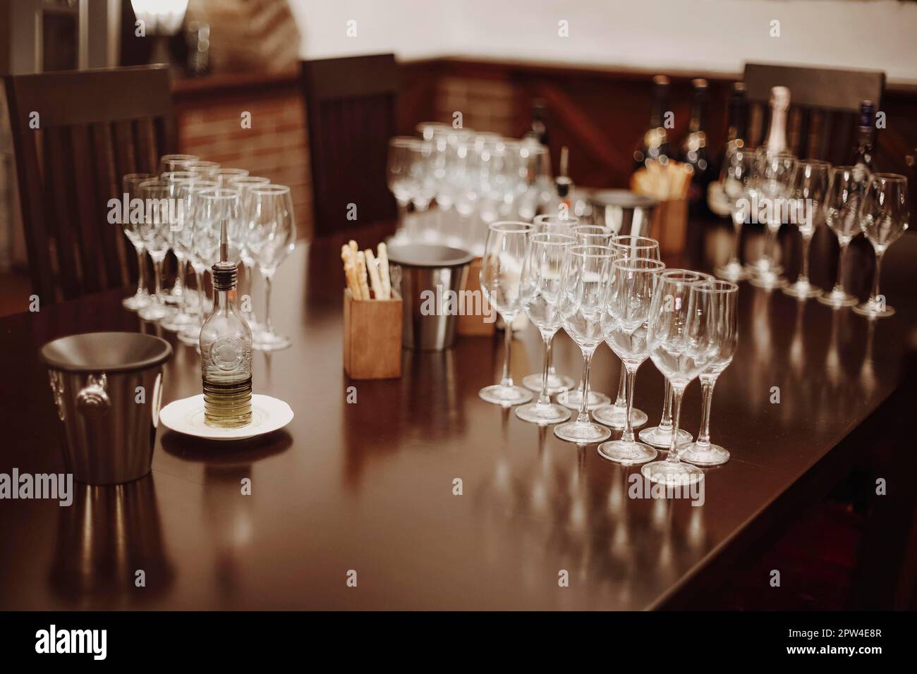 Glass goblets placed in rows on table during wine tasting procedure in ...