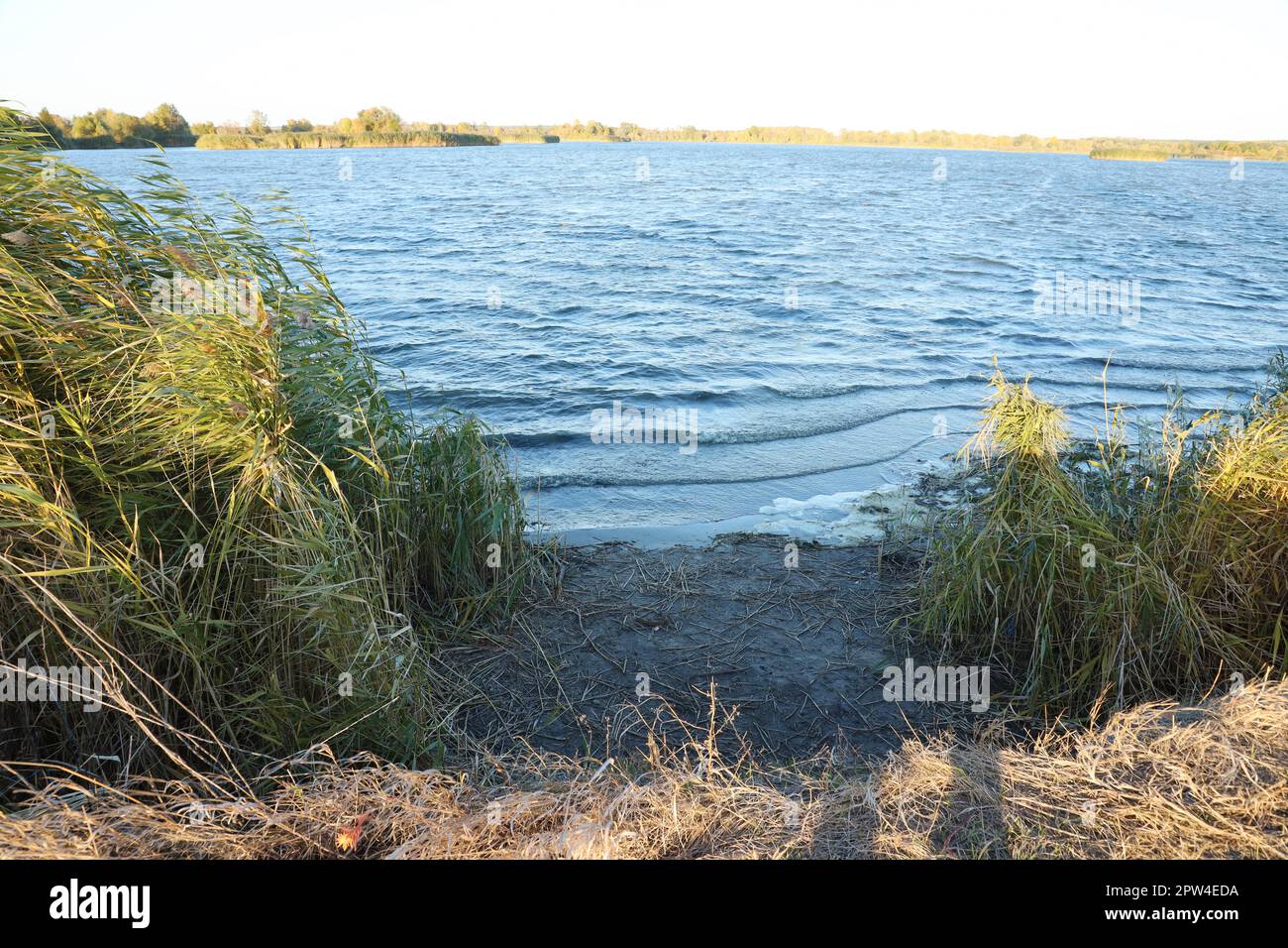 Beautiful autumn landscape with lake and multicoloral trees ...