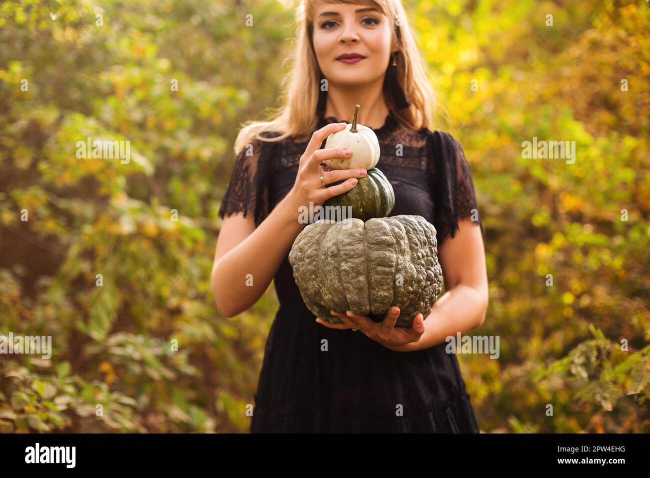 Portrait of beautiful young blond woman with long straight hair and ...