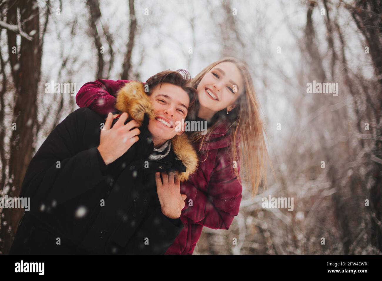 Beautiful young teen couple spending time together outside in cold ...