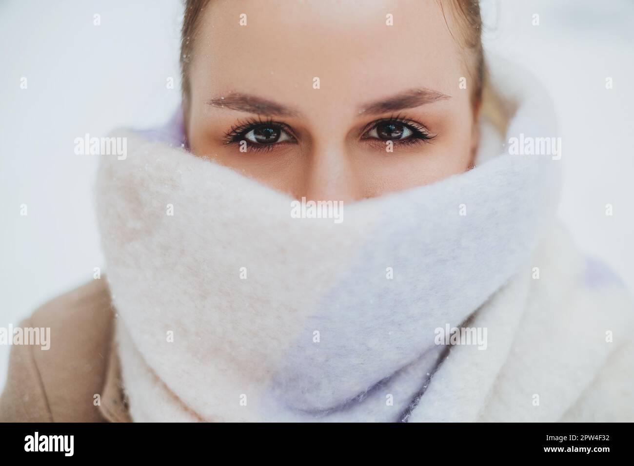 Closeup photo of beautiful brunette female with sharp look, half of ...