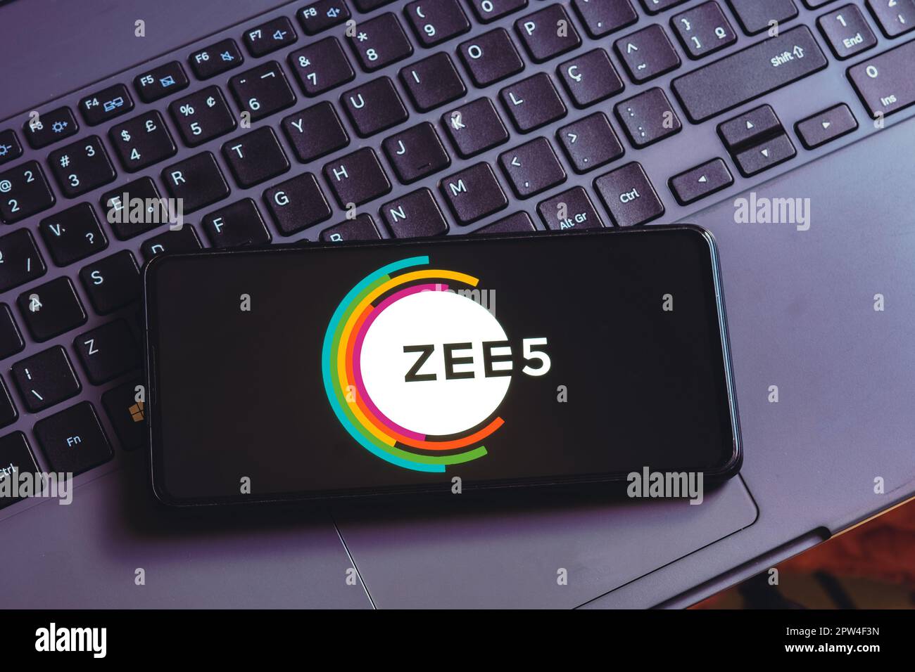 In this photo illustration, the ZEE5 logo is displayed on a smartphone ...