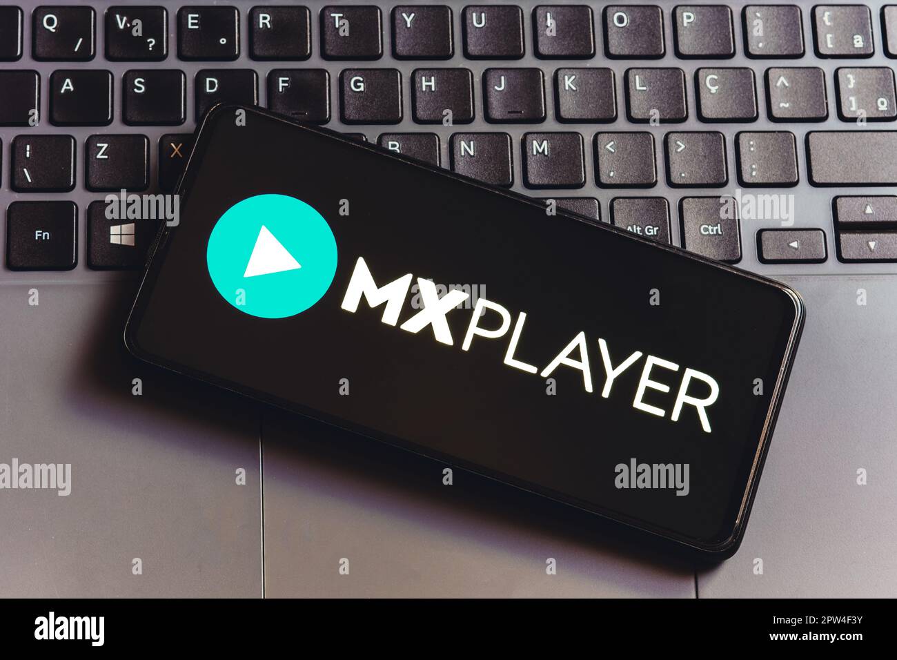 In this photo illustration, the MX Player logo is displayed on a smartphone screen Stock Photo ...