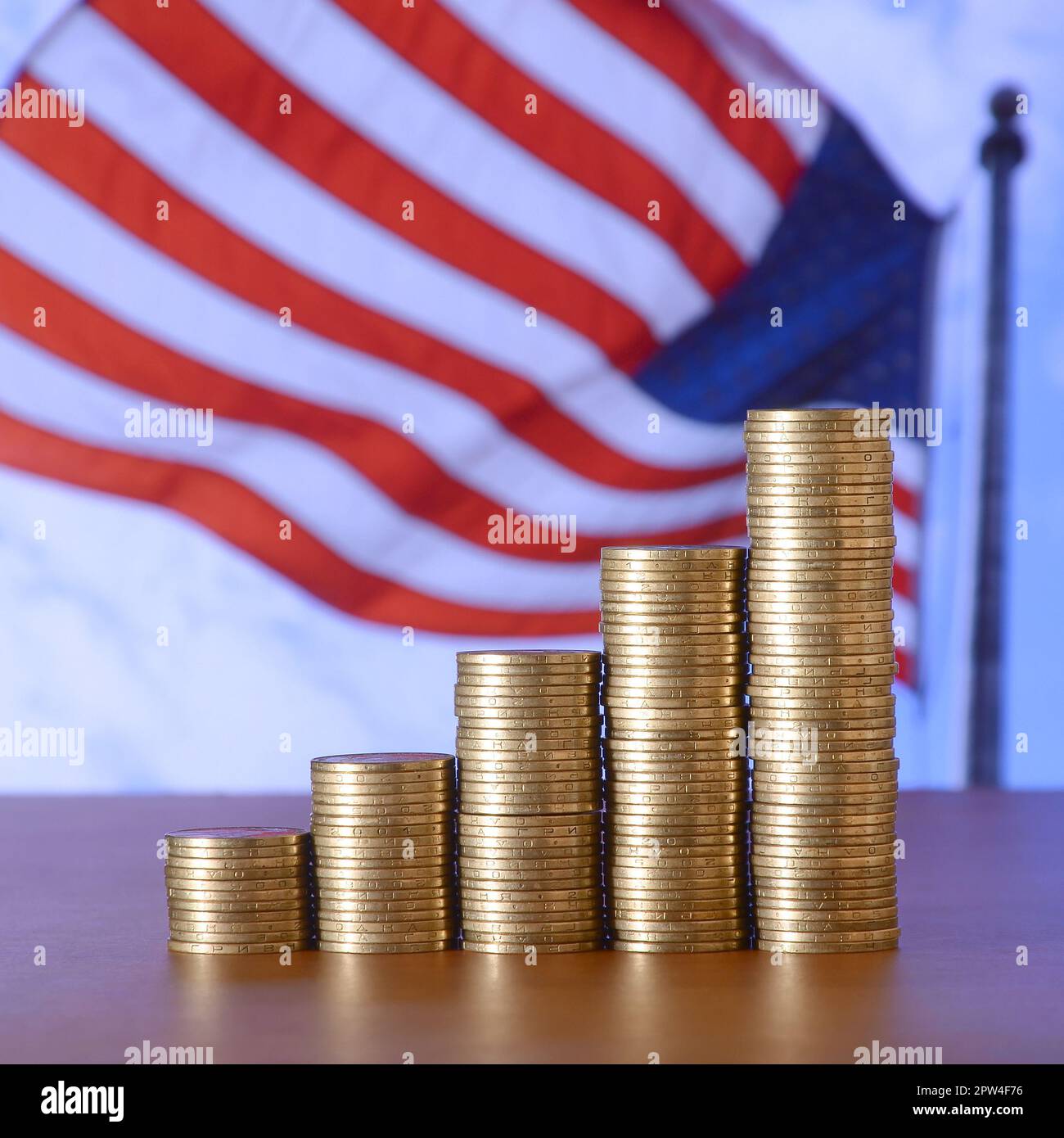 Golden coin stacks arranged as a graph. Increasing columns of coins ...