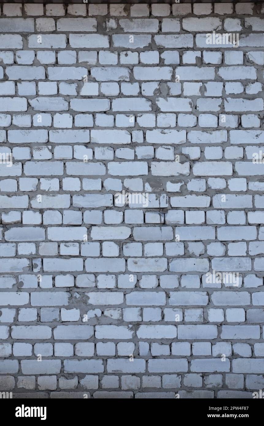 Weathered stained old white brick wall background. Texture of an old ...