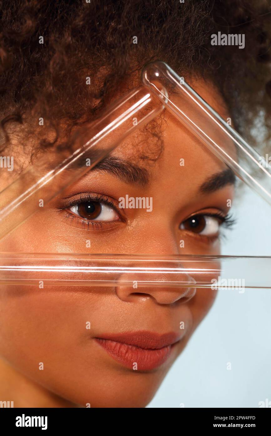 African female beauty. Closeup portrait of young beautiful black curly ...