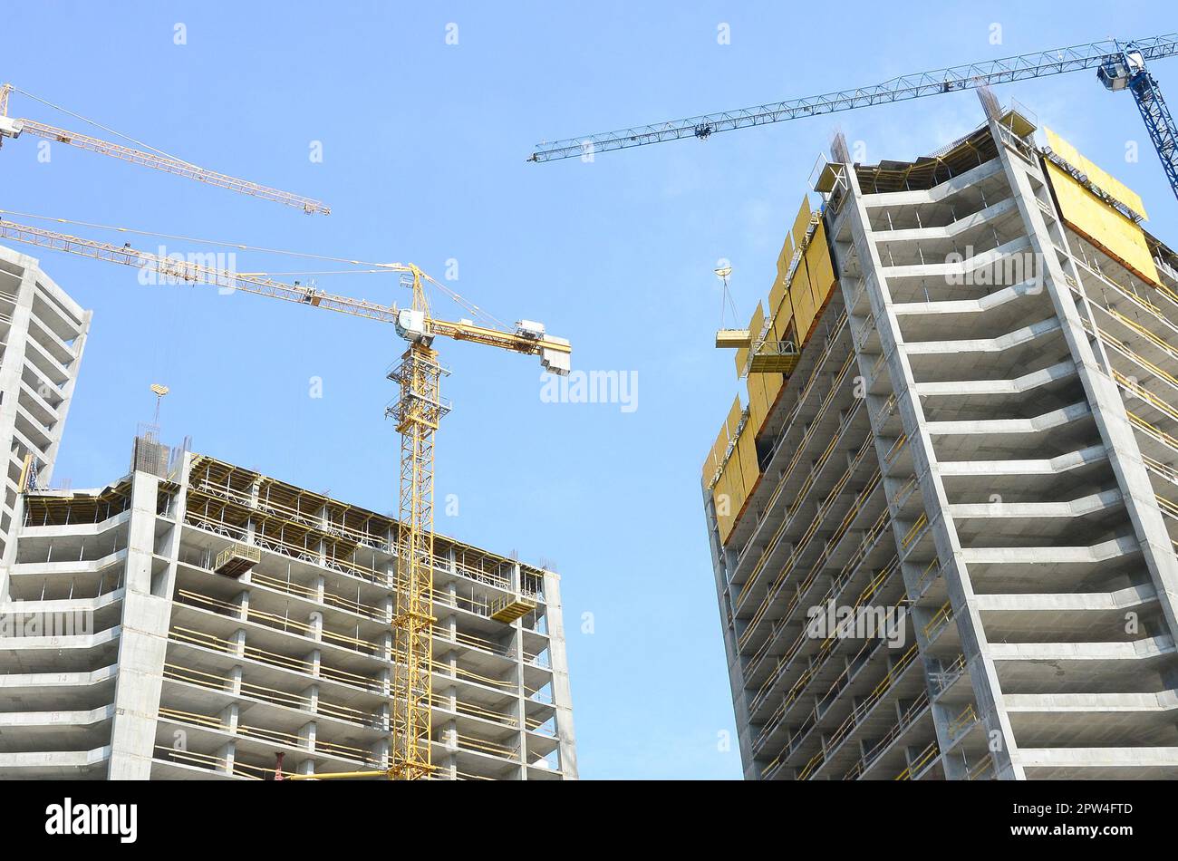 Construction site. High rise multi storey buildings under construction ...