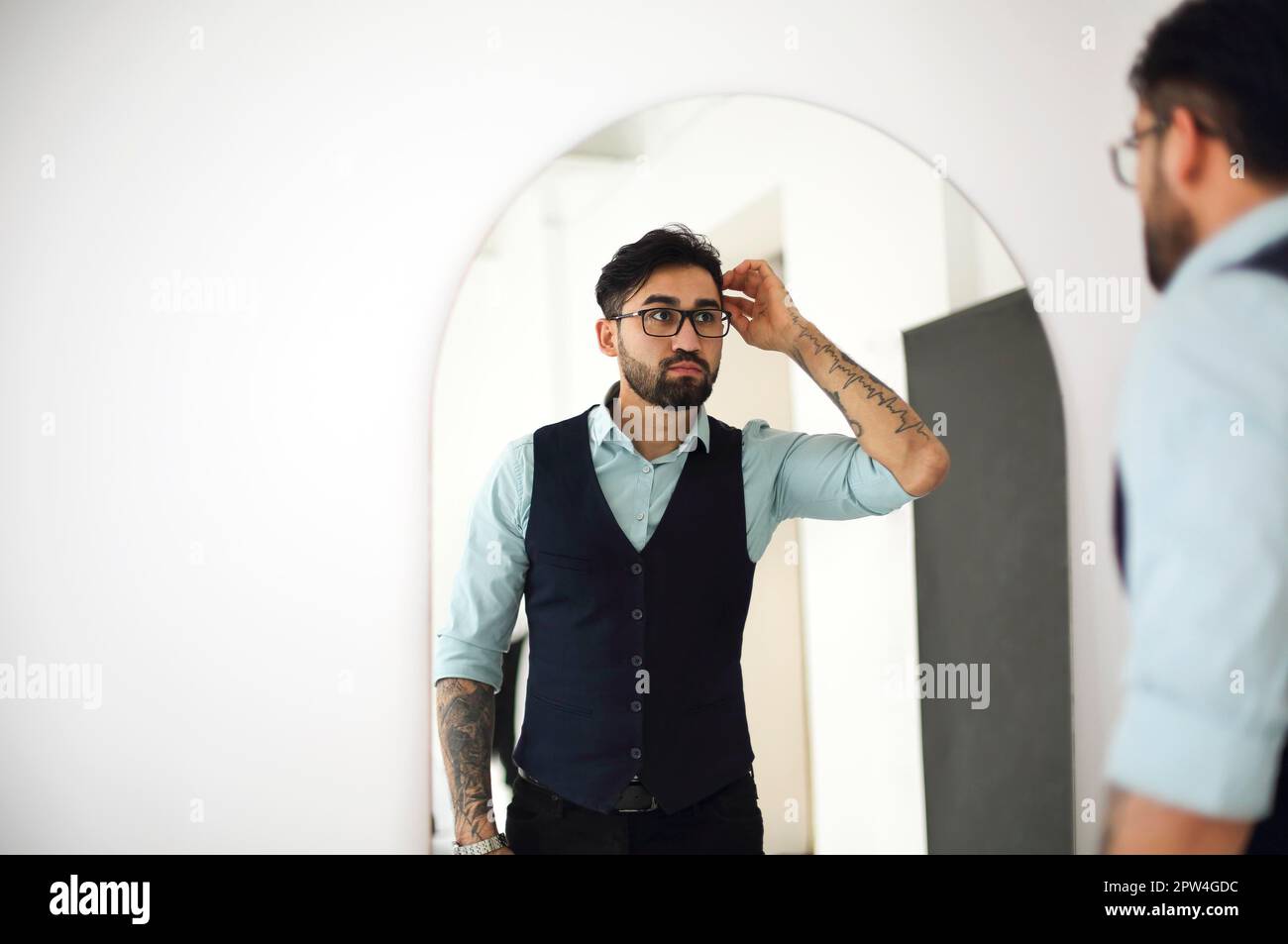 Brunette handsome respectable business person in elegant classic ...