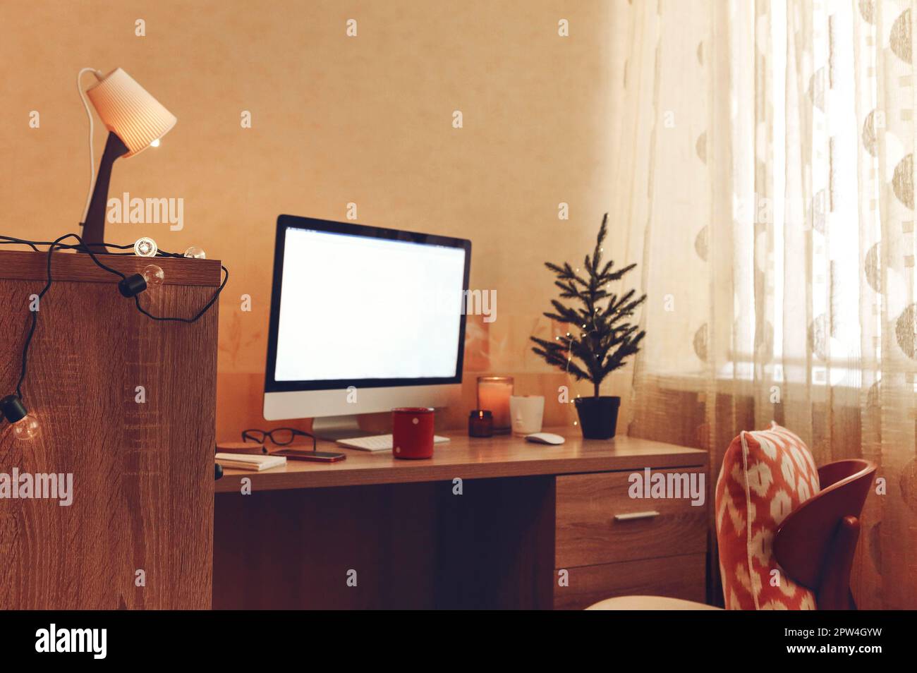 Computer on table in room. Celebration of Christmas online due holiday ...