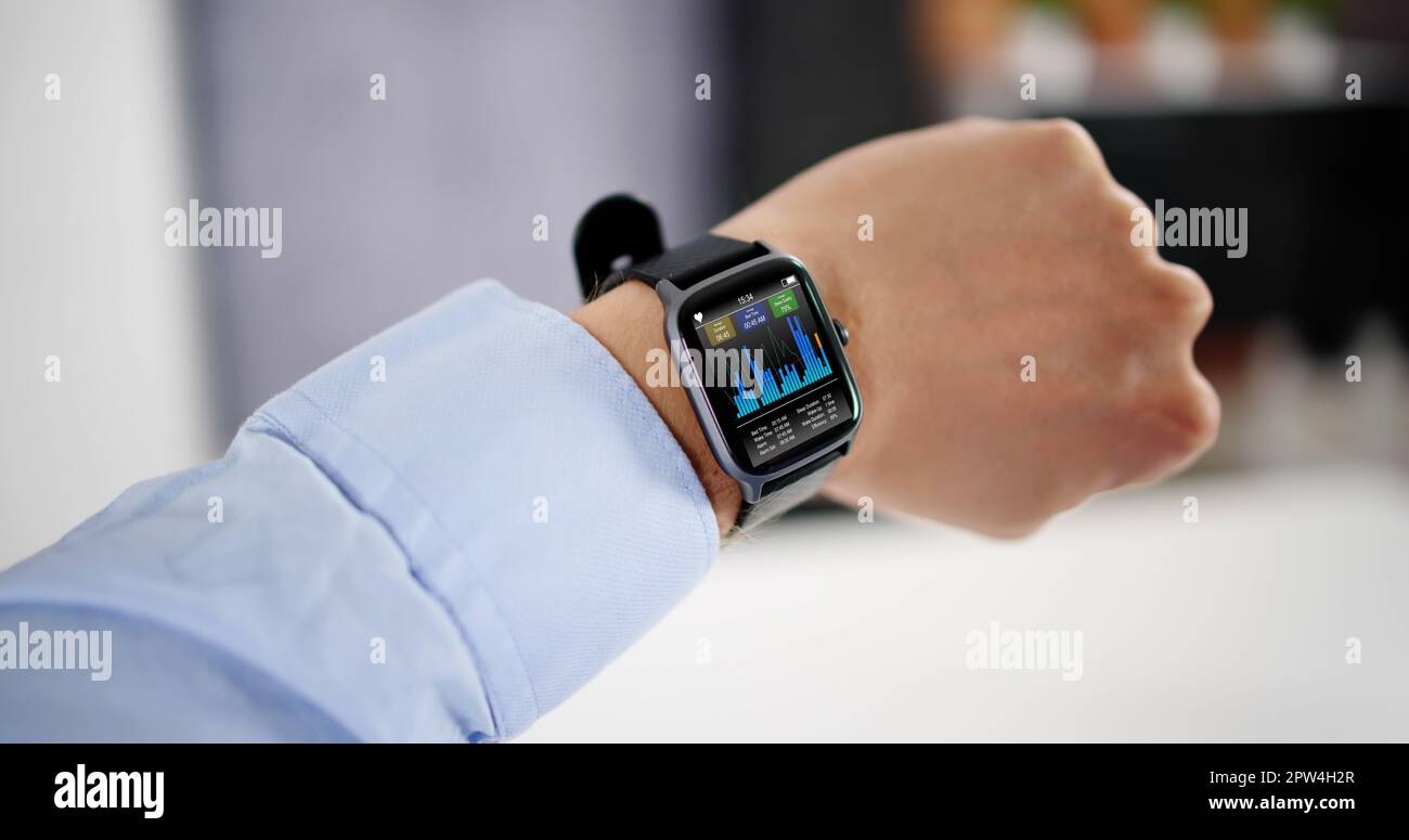 Smart Watch Showing Heartbeat Monitor On Man's Hand Stock Photo - Alamy