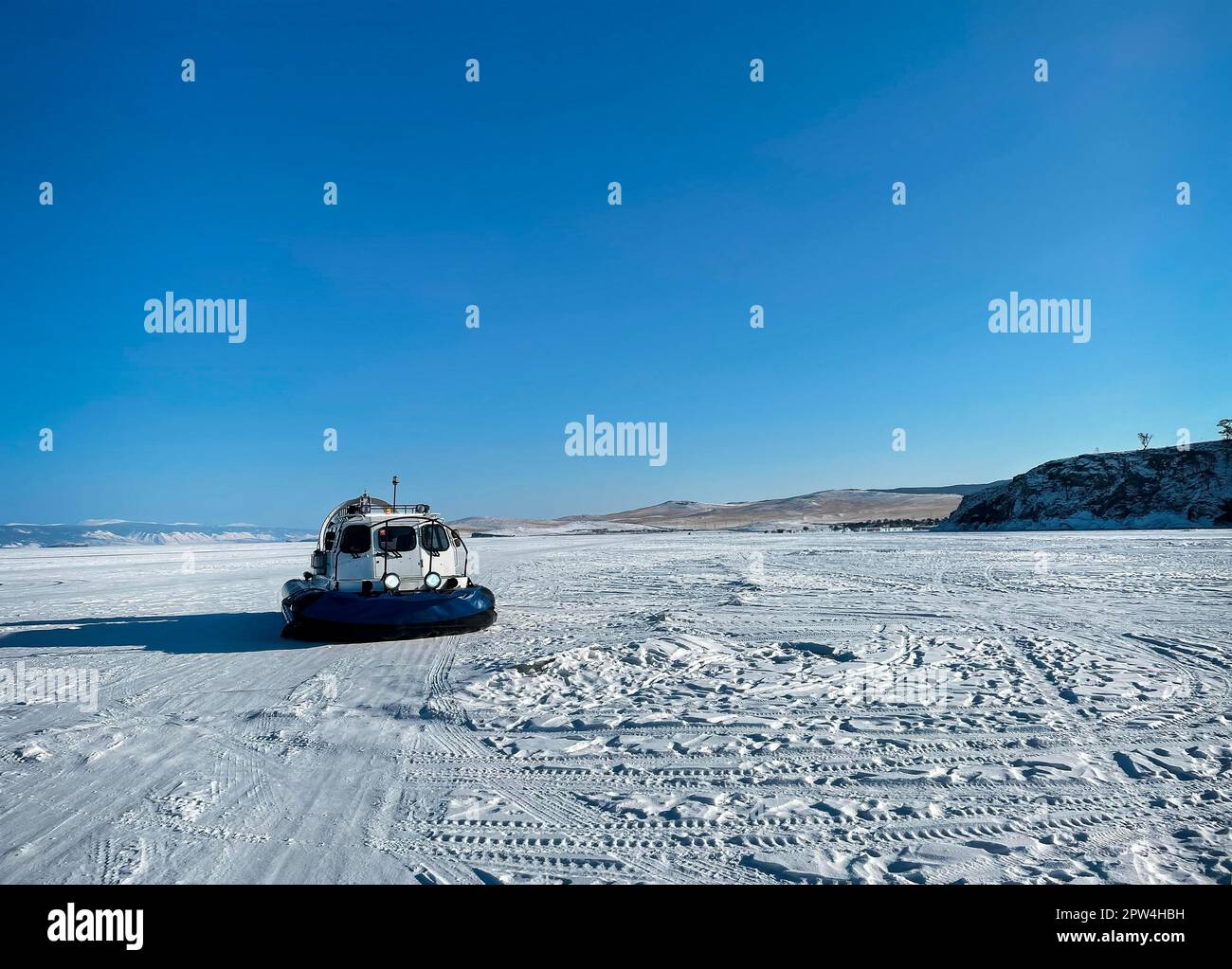 Khivus winter transport on ice. Hovercraft. Ice on the surface of the ...
