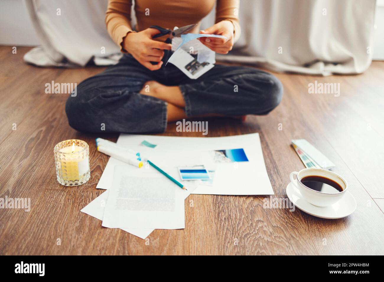 Young brunette african american woman creating her Feng Shui wish map ...