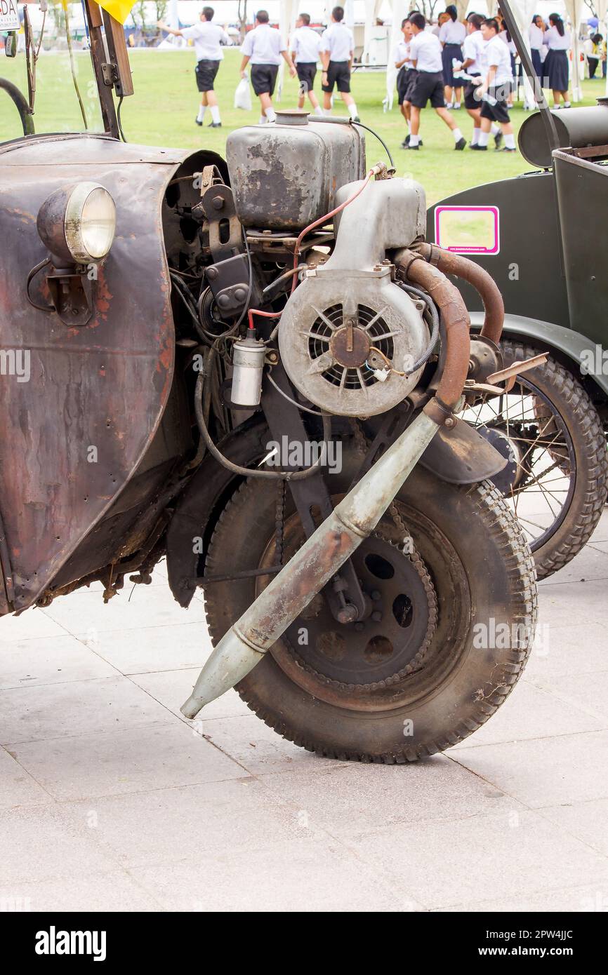 Vintage car engine on the front wheel Stock Photo - Alamy