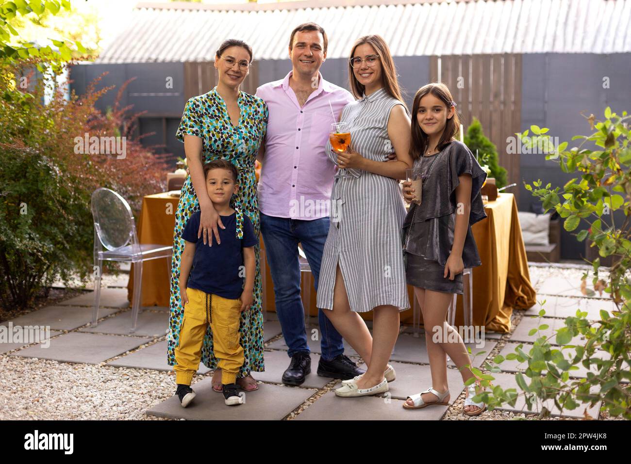 Family participates in the organization of dinner. Family of five ...