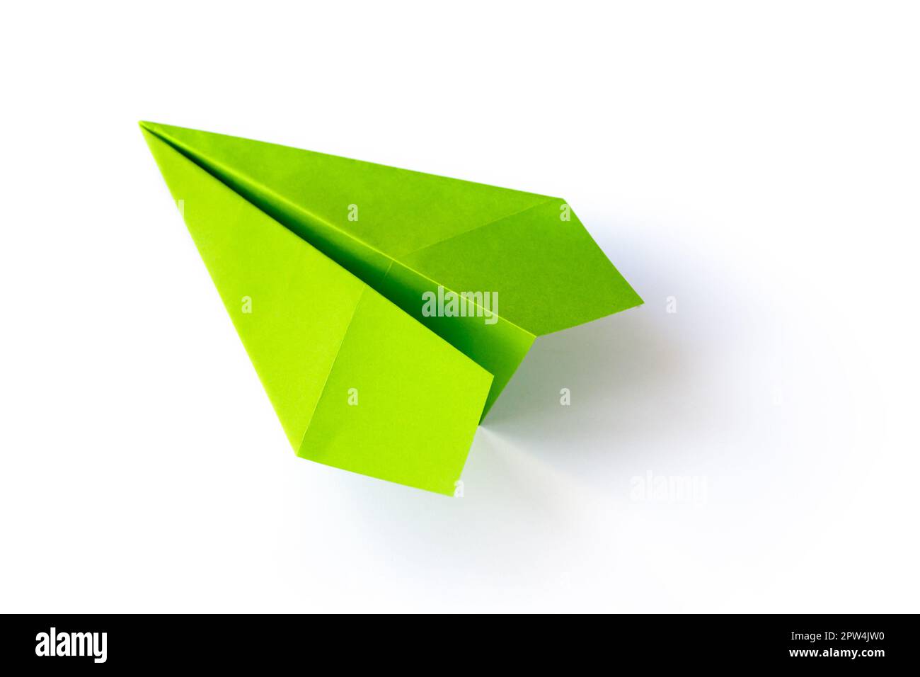 Green paper plane origami isolated on a blank white background Stock ...