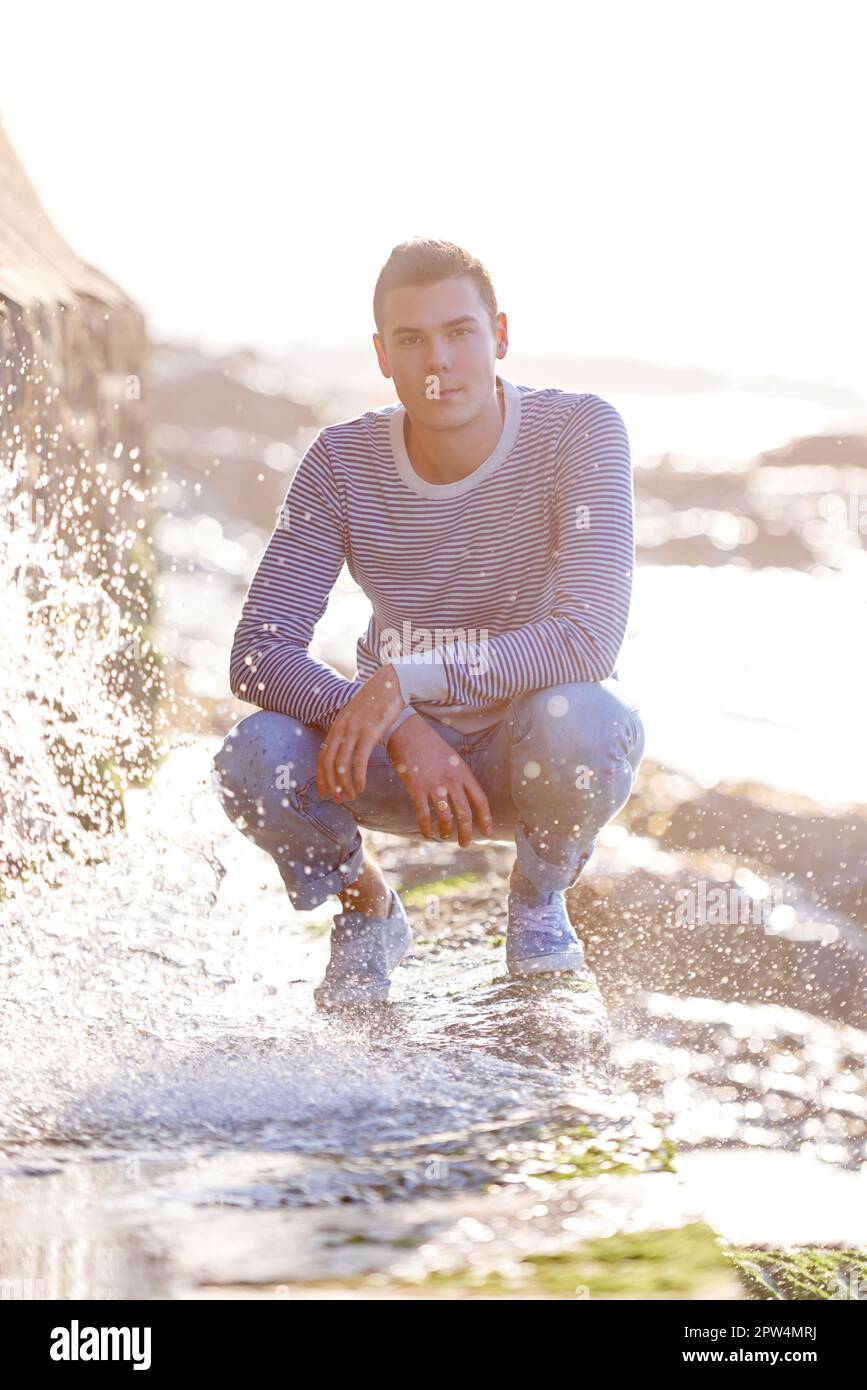 Crouching beside hi-res stock photography and images - Alamy