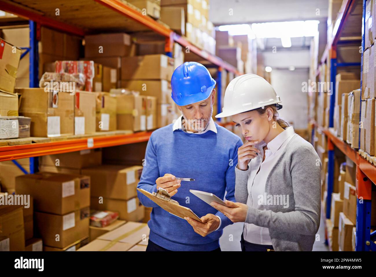 Inspecting boxes hi-res stock photography and images - Alamy