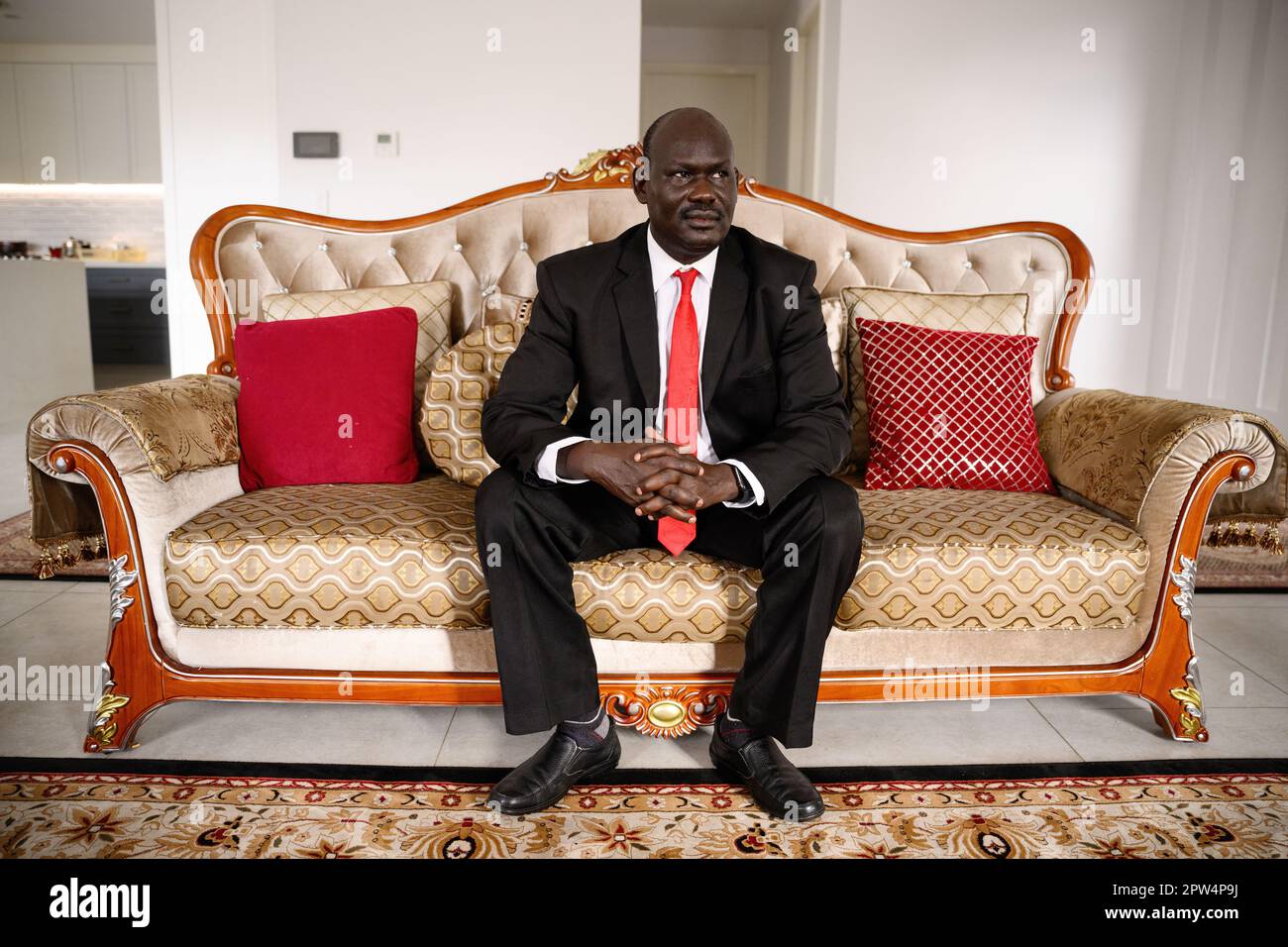 South Sudanese refugee Emmanuel Kondok poses for a photograph at his ...