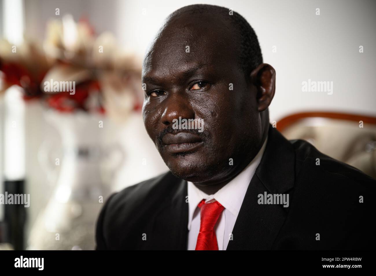 South Sudanese refugee Emmanuel Kondok poses for a photograph at his ...