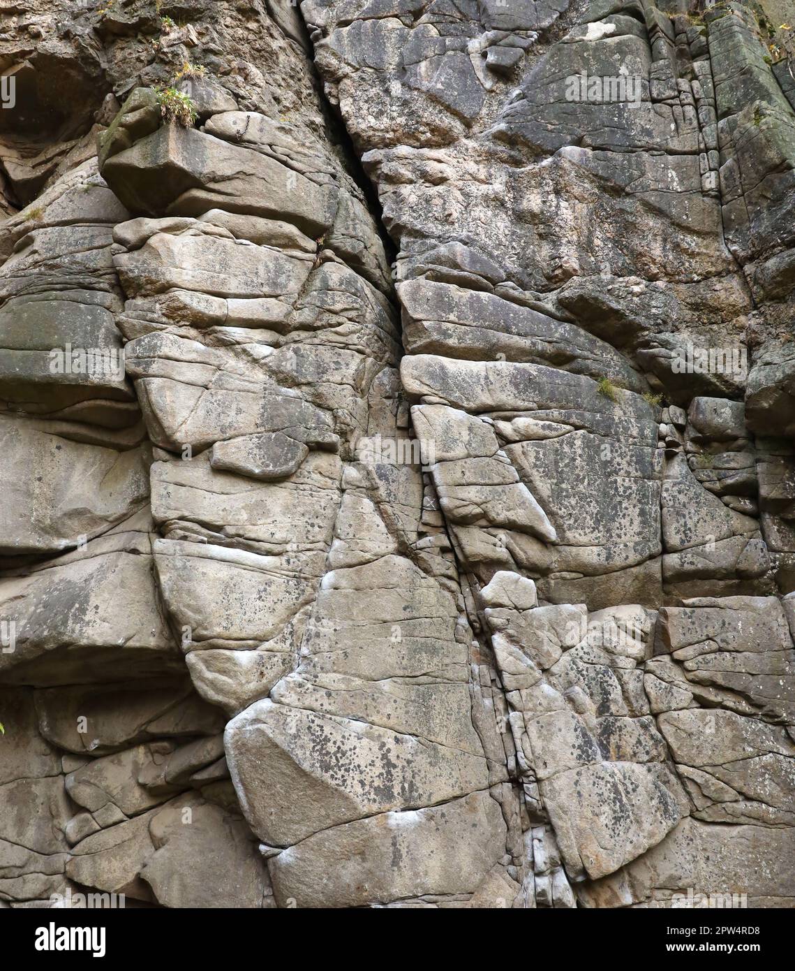 Light coarse natural rock stone background. Mining cliff rough front ...