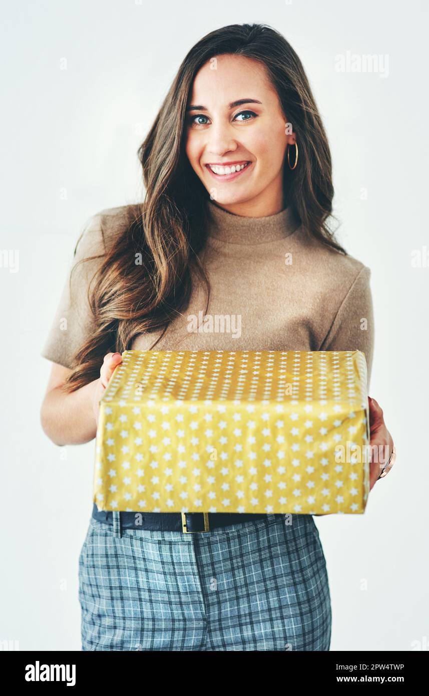 Gift, portrait and woman with a box in studio for winning a prize ...