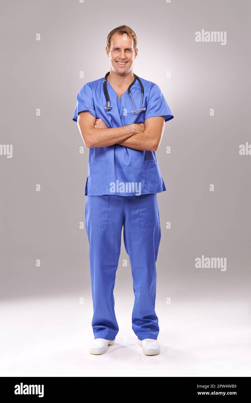 Surgery was a success. Full length portrait of a handsome male doctor ...